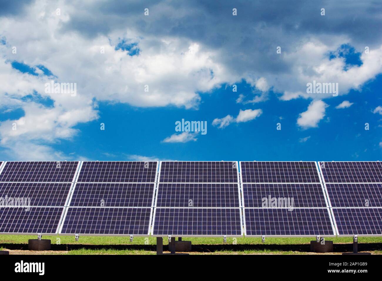 Solar panels in field against sun hi-res stock photography and images ...