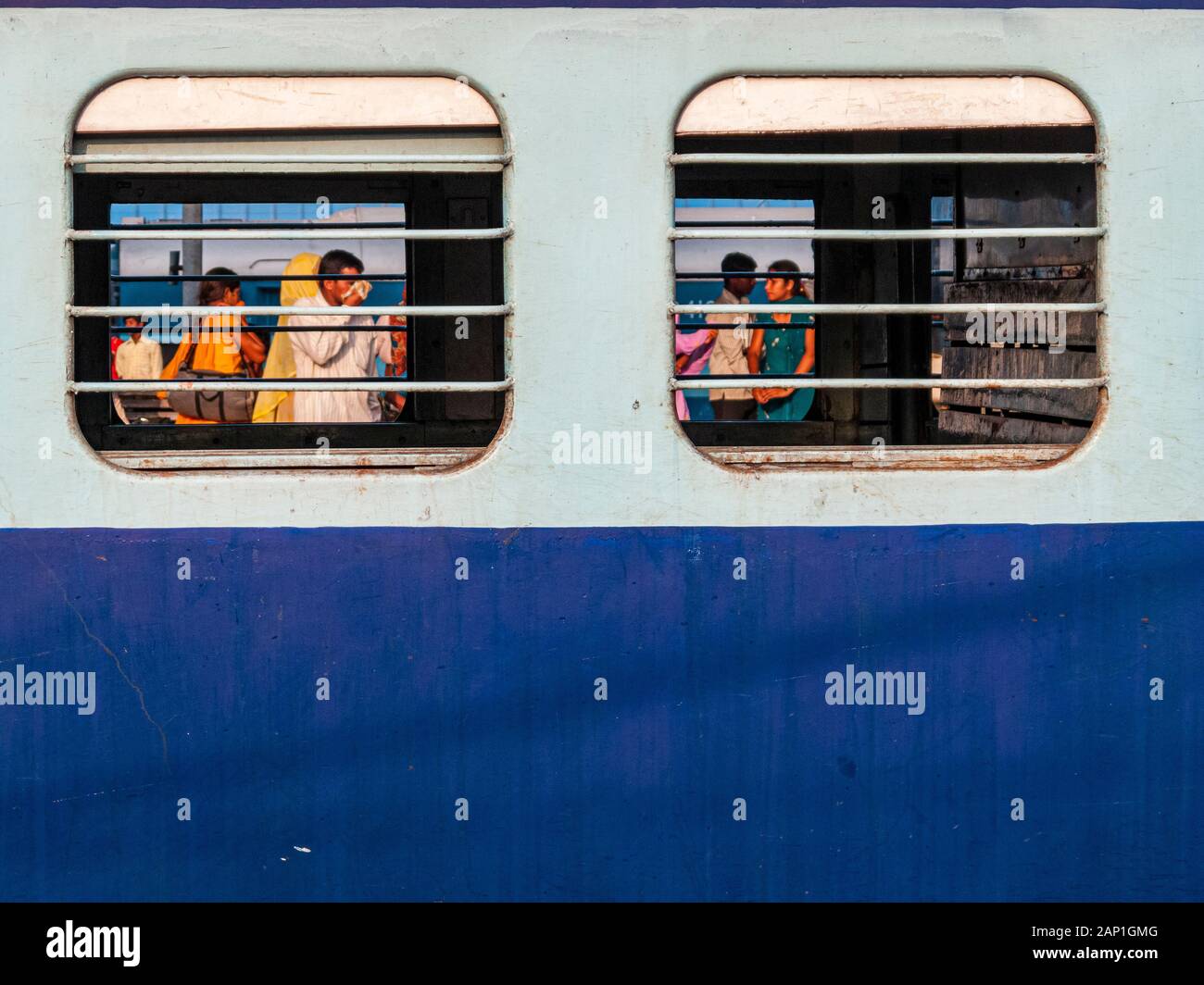 Bars for security in front of the windows of an indian railway coach ...