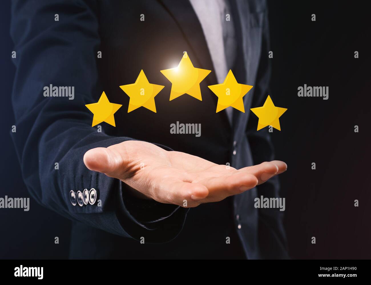 Unrecognizable Businessman Holding Five Stars Icons On Open Hand Stock ...