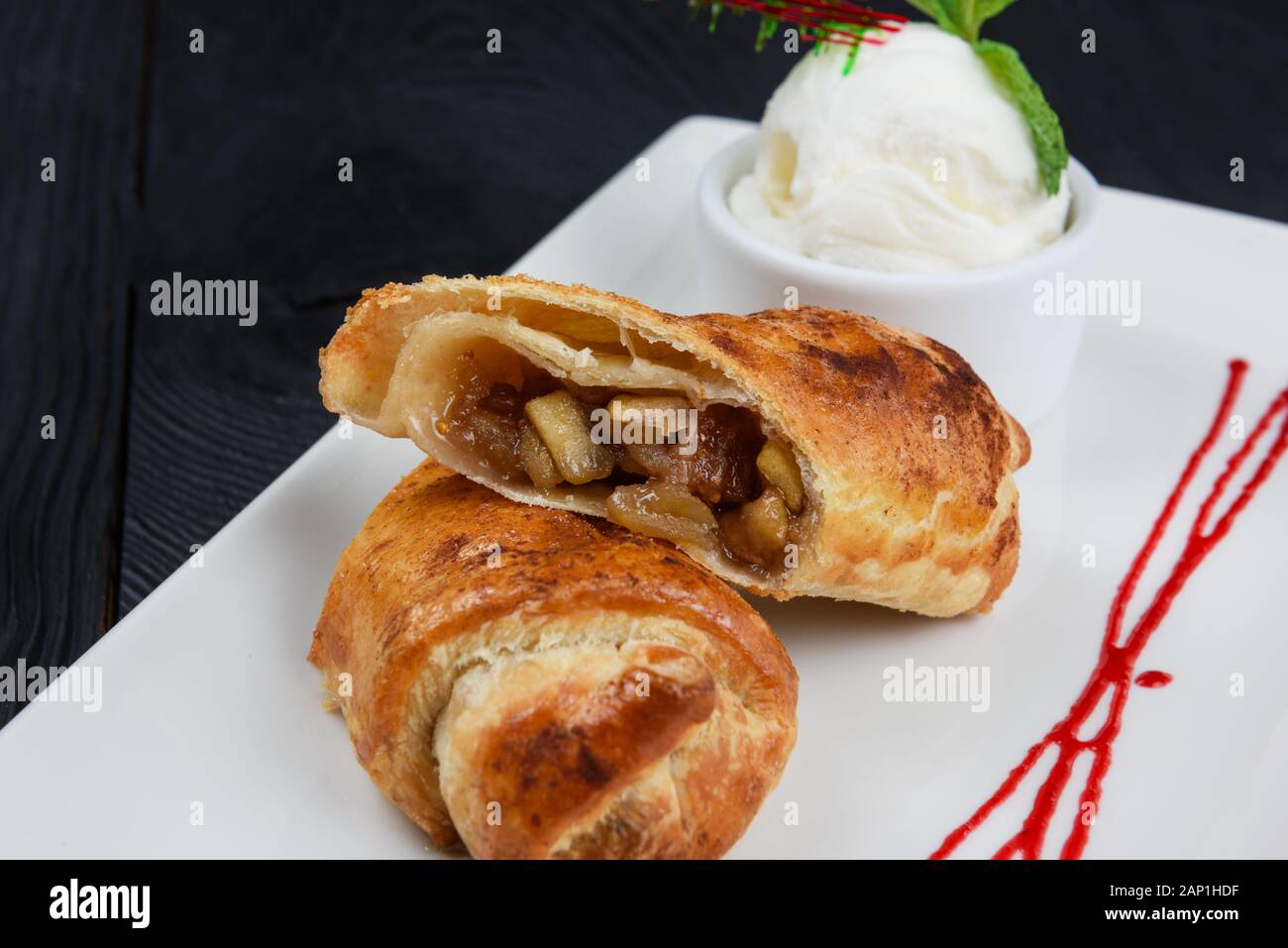 Apple strudel with vanilla ice cream Stock Photo - Alamy