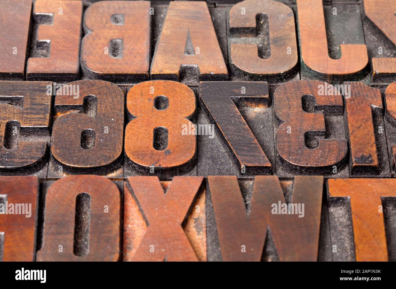 Wooden book printing letters Stock Photo - Alamy