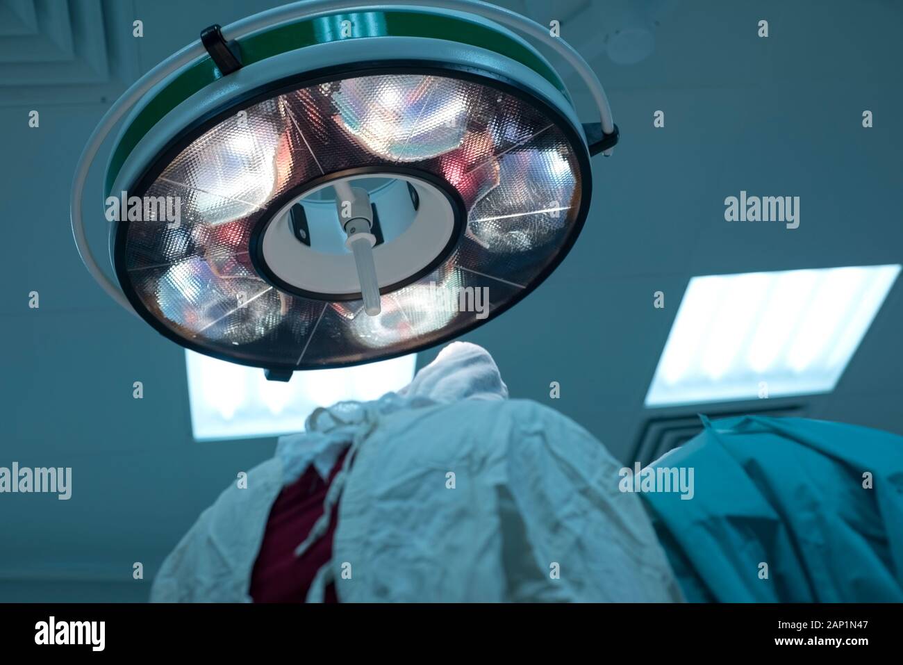 low angle, pediatric surgeons perform surgery in a sterile operating ...