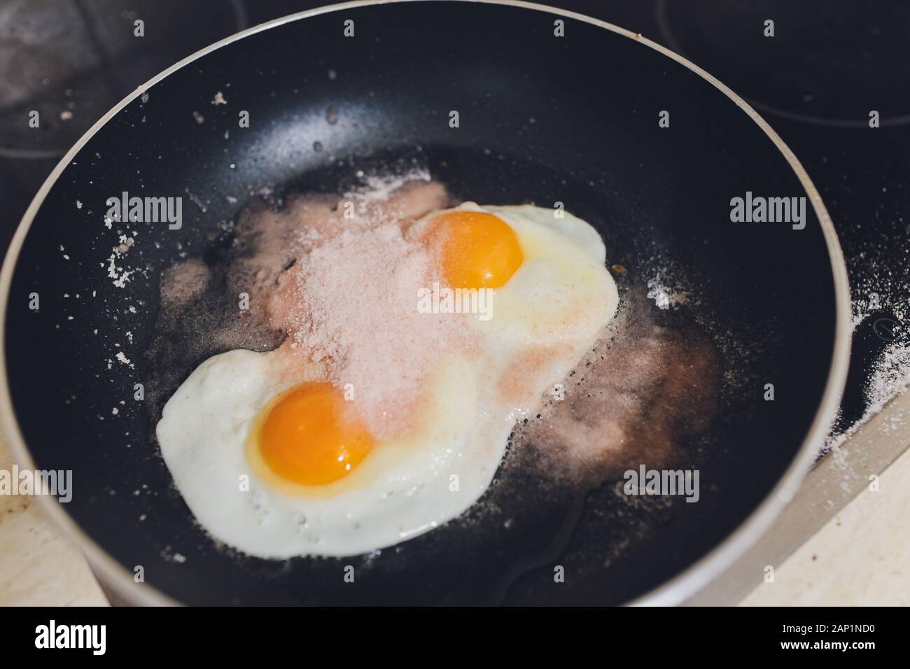 Appetizing photograph of scrambled eggs from one chicken egg in a pan ...