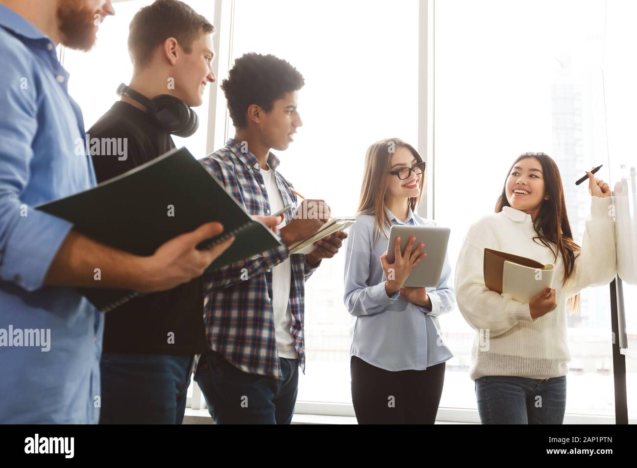 Diverse discuss students classroom hi-res stock photography and images ...