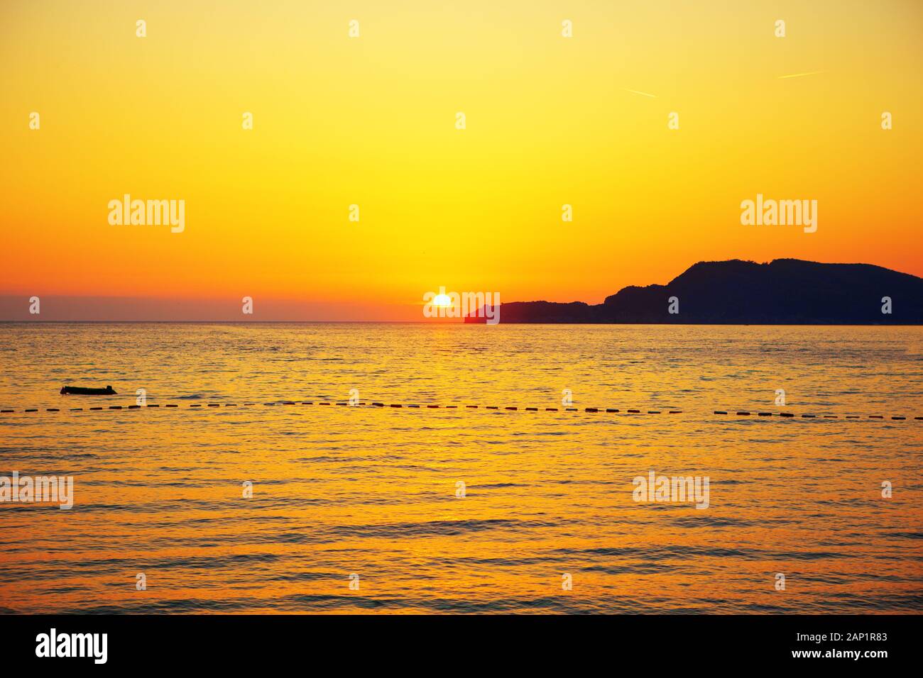 sunset over the island in the sea Stock Photo - Alamy