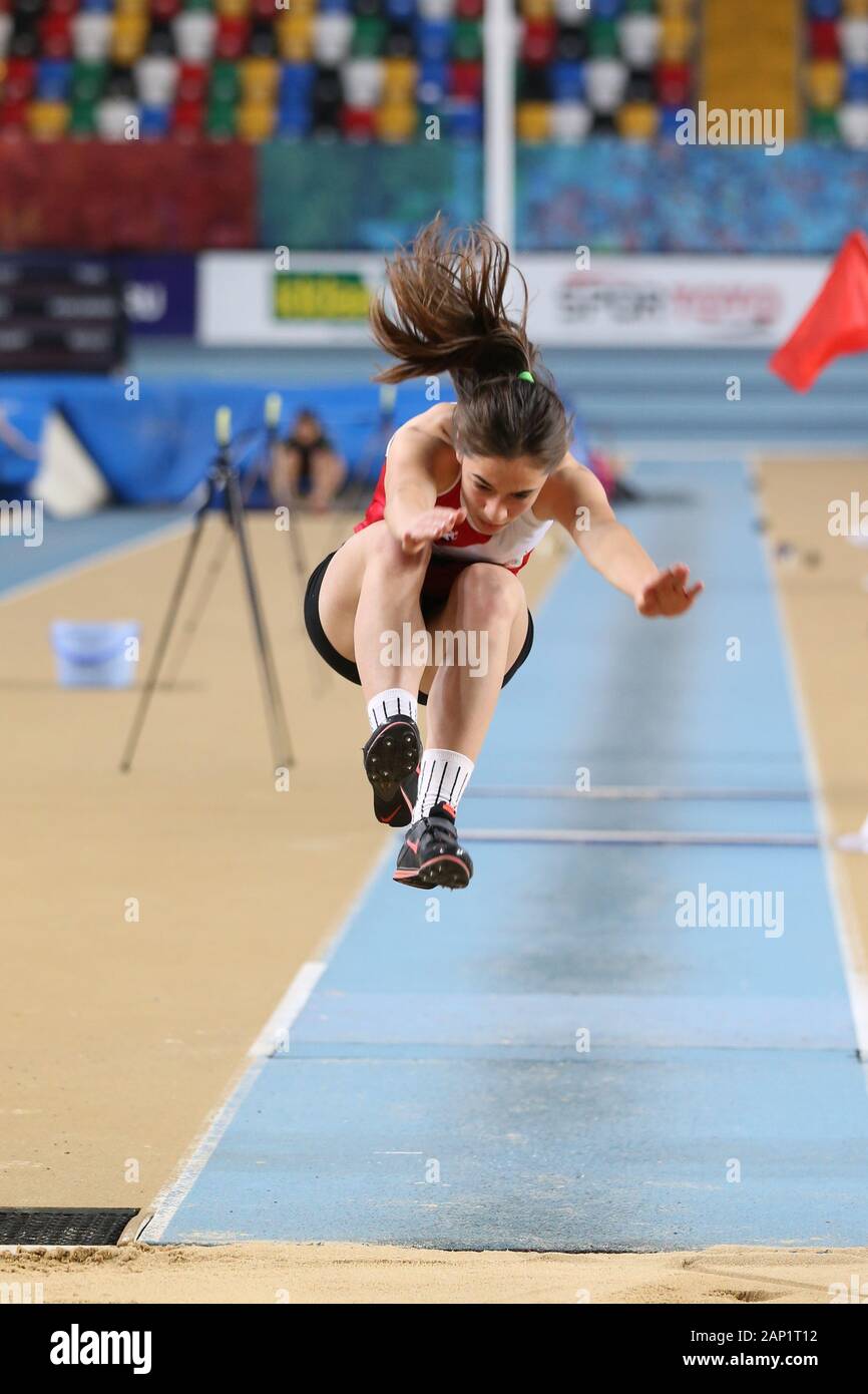 ISTANBUL, TURKEY - JANUARY 11, 2020: Undefined athlete triple jumping ...