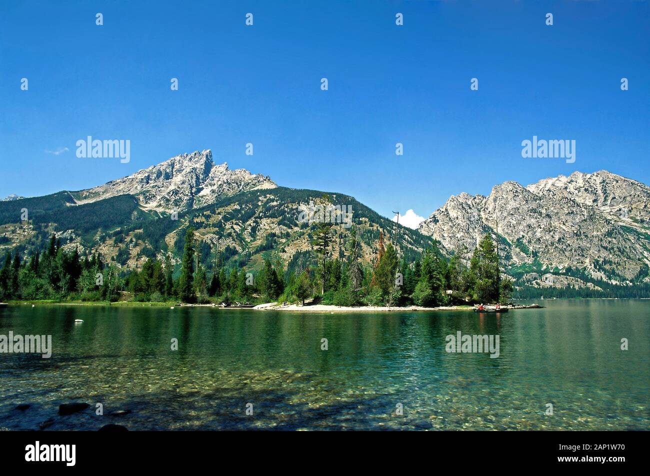 Jenny Lake; Teton Mountain Range; canoe; clear water; nature, Grand ...