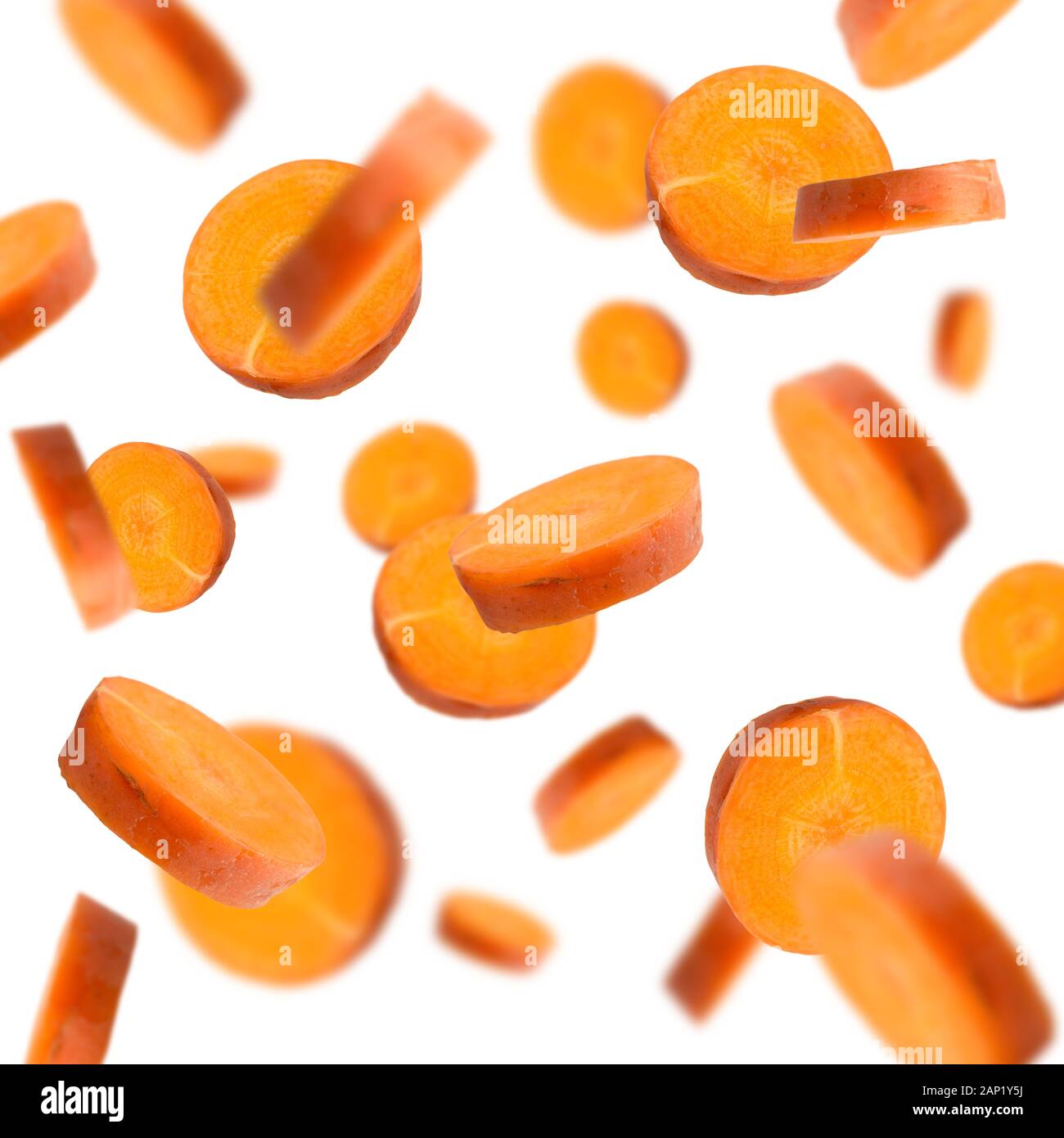 Flying fresh carrot isolated on white background Stock Photo - Alamy
