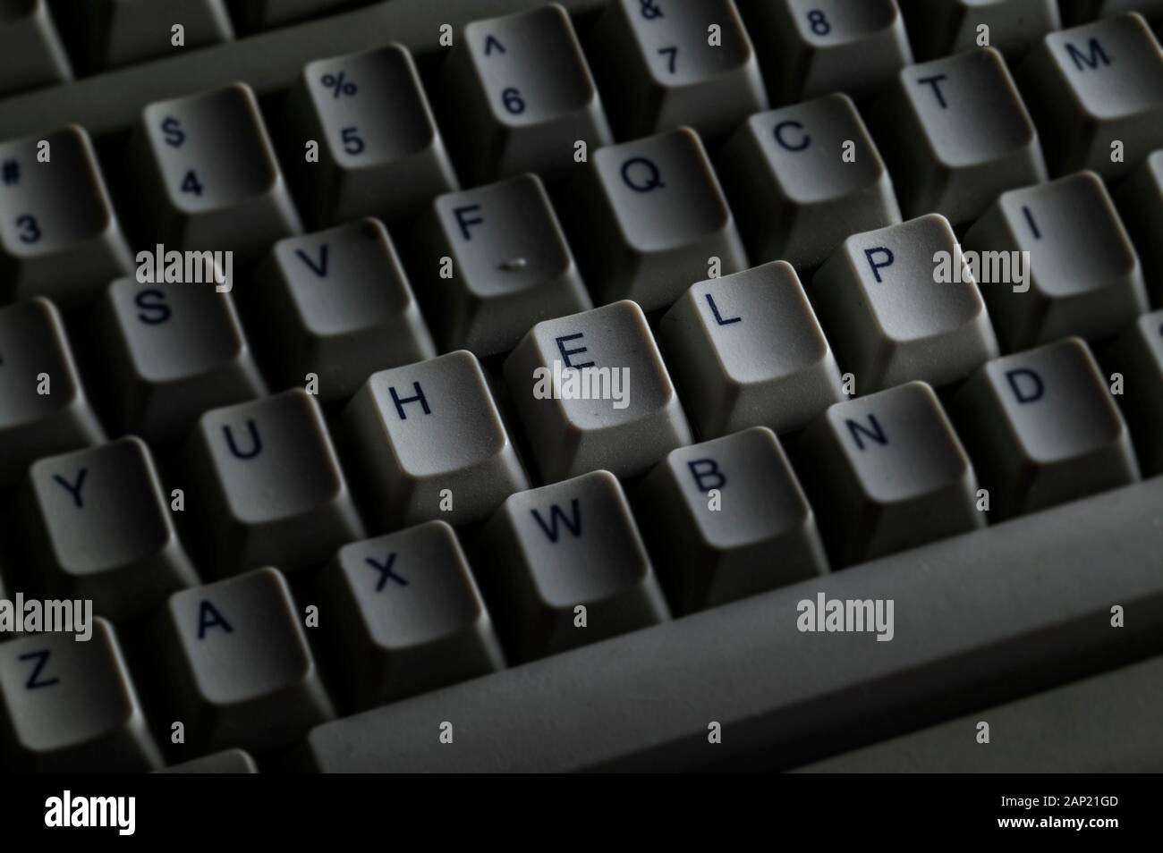 The word "help" displayed on the computer keyboard Stock Photo - Alamy