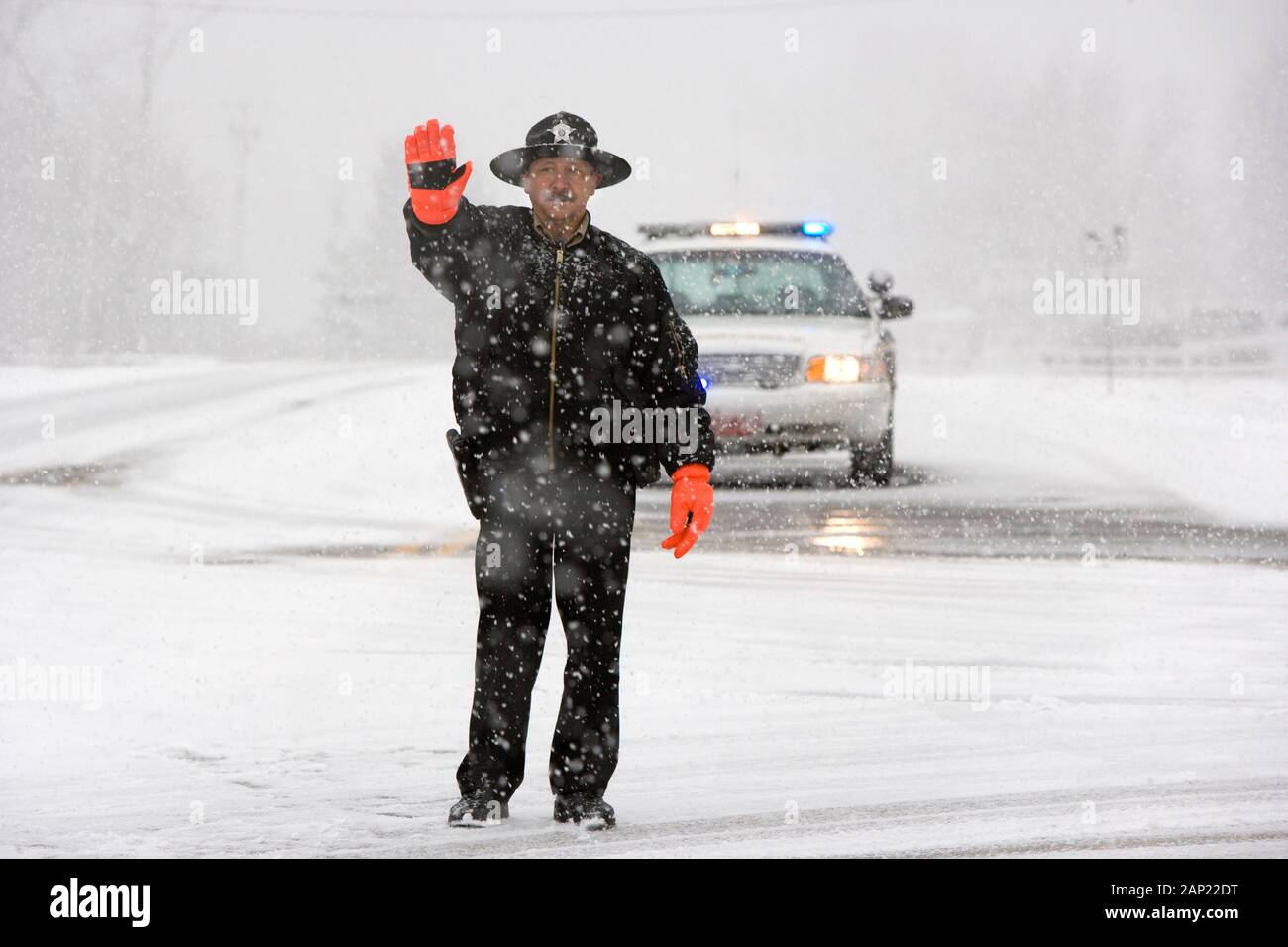 Traffic policeman stop hand signal hi-res stock photography and images ...