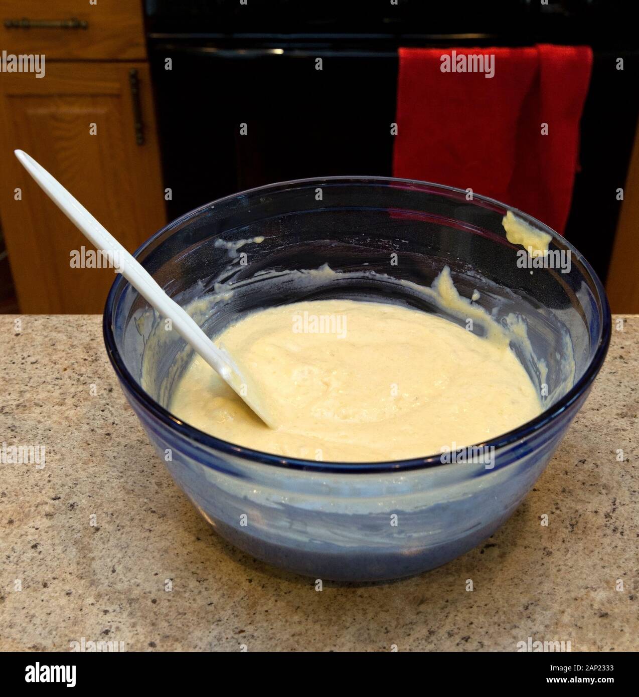 Mixing bowl with mixed batter ready to make Aebleskiver, Danish ...