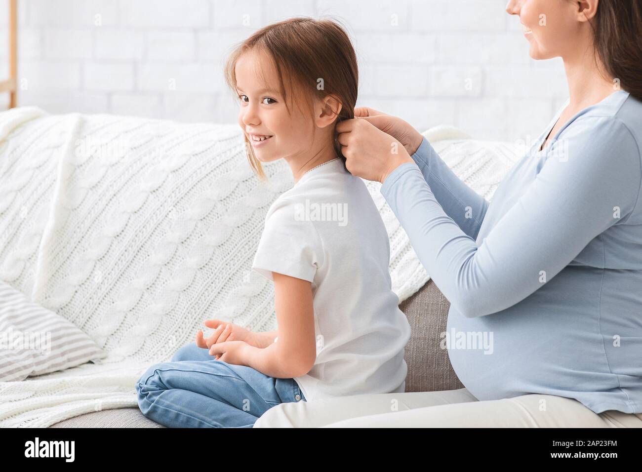 Close up of happy little girl spending time with mom Stock Photo - Alamy