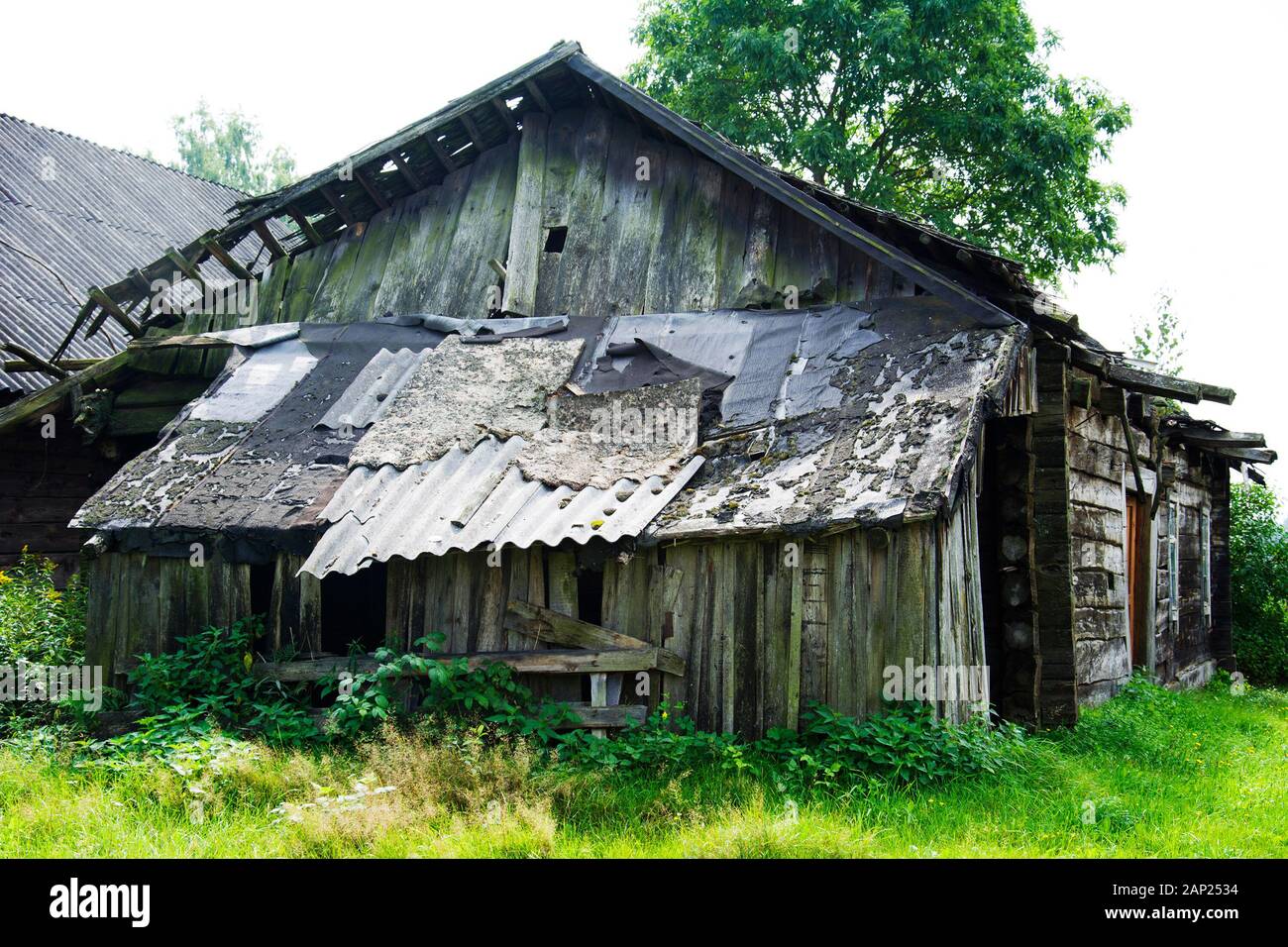 the building affected by the hurricane. an old abandoned house with a ...