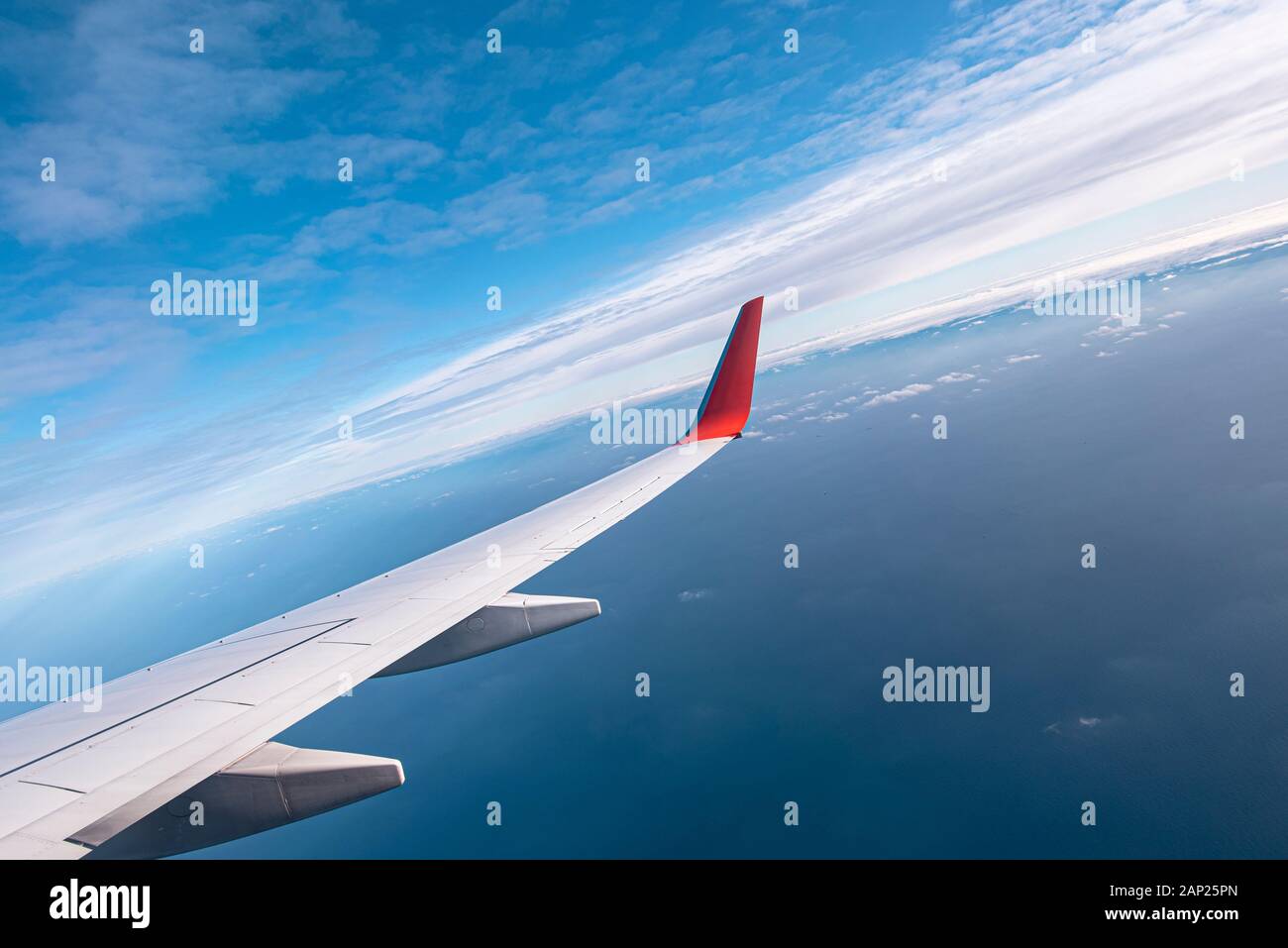 Sky through the window of Aircraft, Sunrise above Clouds Stock Photo ...