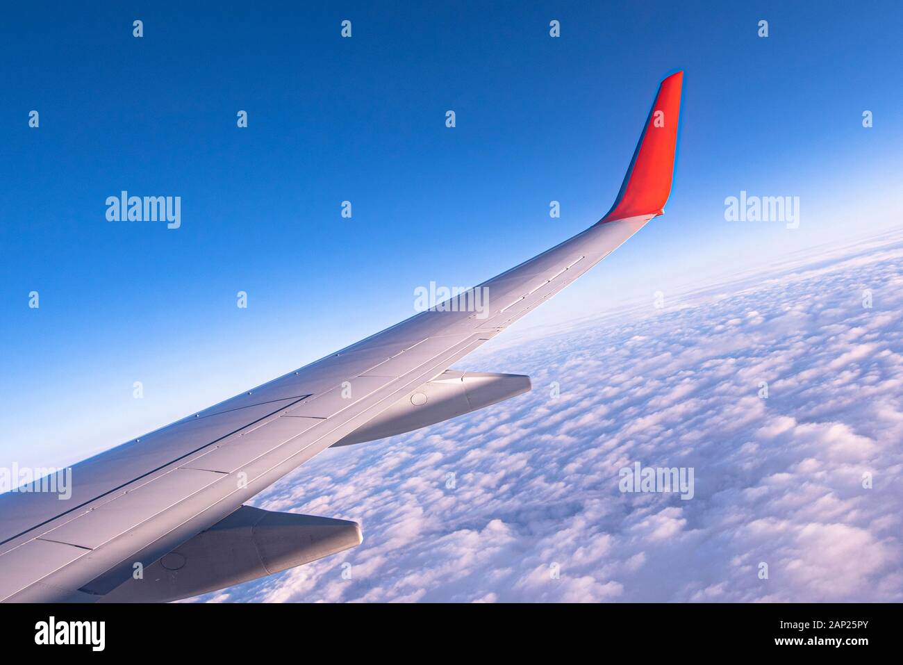 Sky through the window of Aircraft, Sunrise above Clouds Stock Photo ...