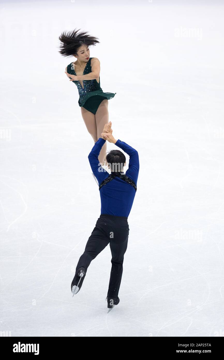 Wenjing Sui and Cong Han of China compete during senior pairs free ...