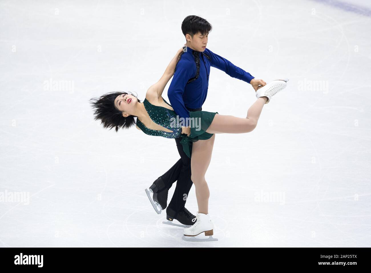 Wenjing Sui and Cong Han of China compete during senior pairs free ...