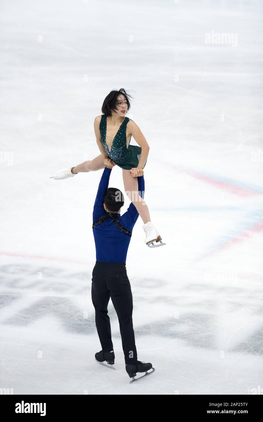 Wenjing Sui and Cong Han of China compete during senior pairs free ...