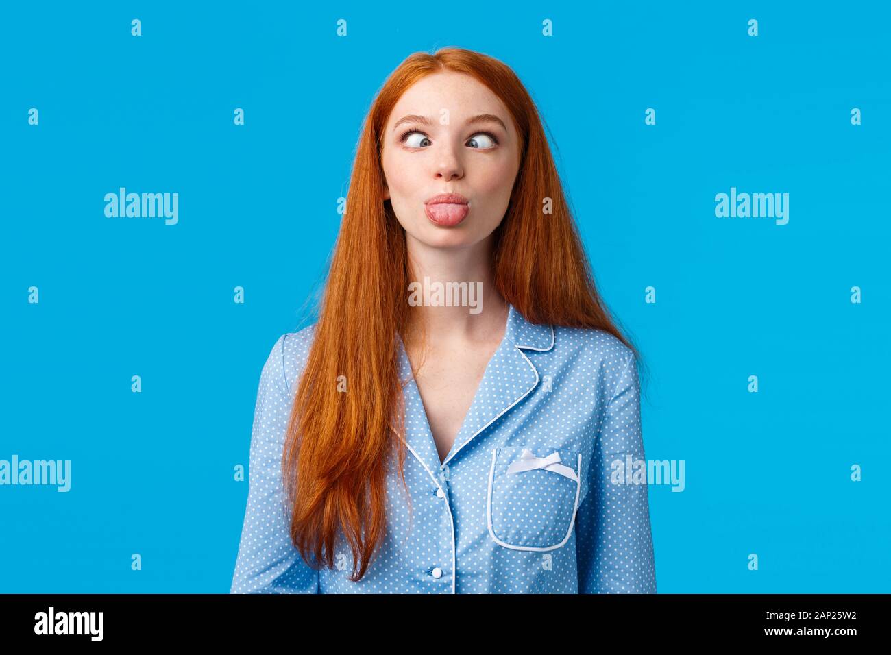 Be funny and silly. Redhead carefree and enthusiastic caucasian girl ...