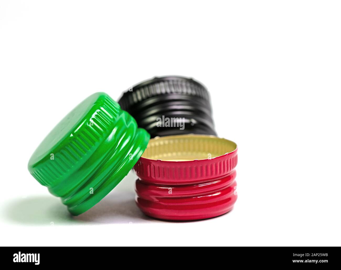 Colorful caps for bottles against white background Stock Photo - Alamy