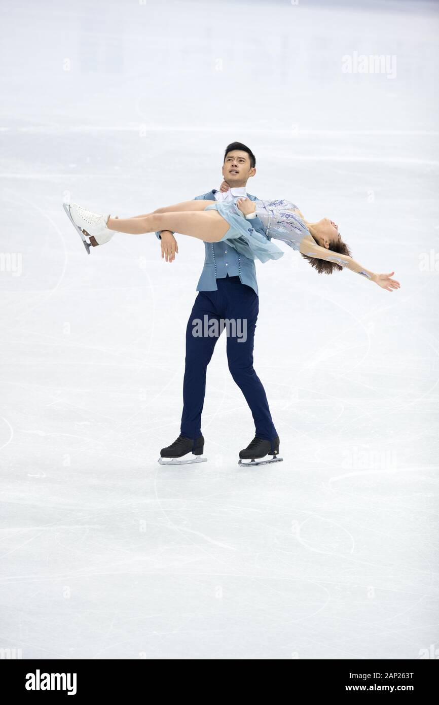 Cheng Peng and Yang Jin of China compete during senior pairs free ...