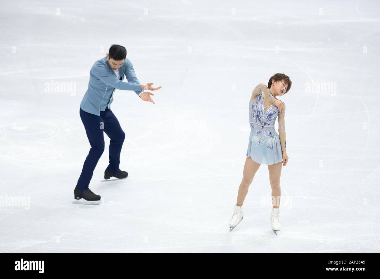 Cheng Peng and Yang Jin of China compete during senior pairs free ...