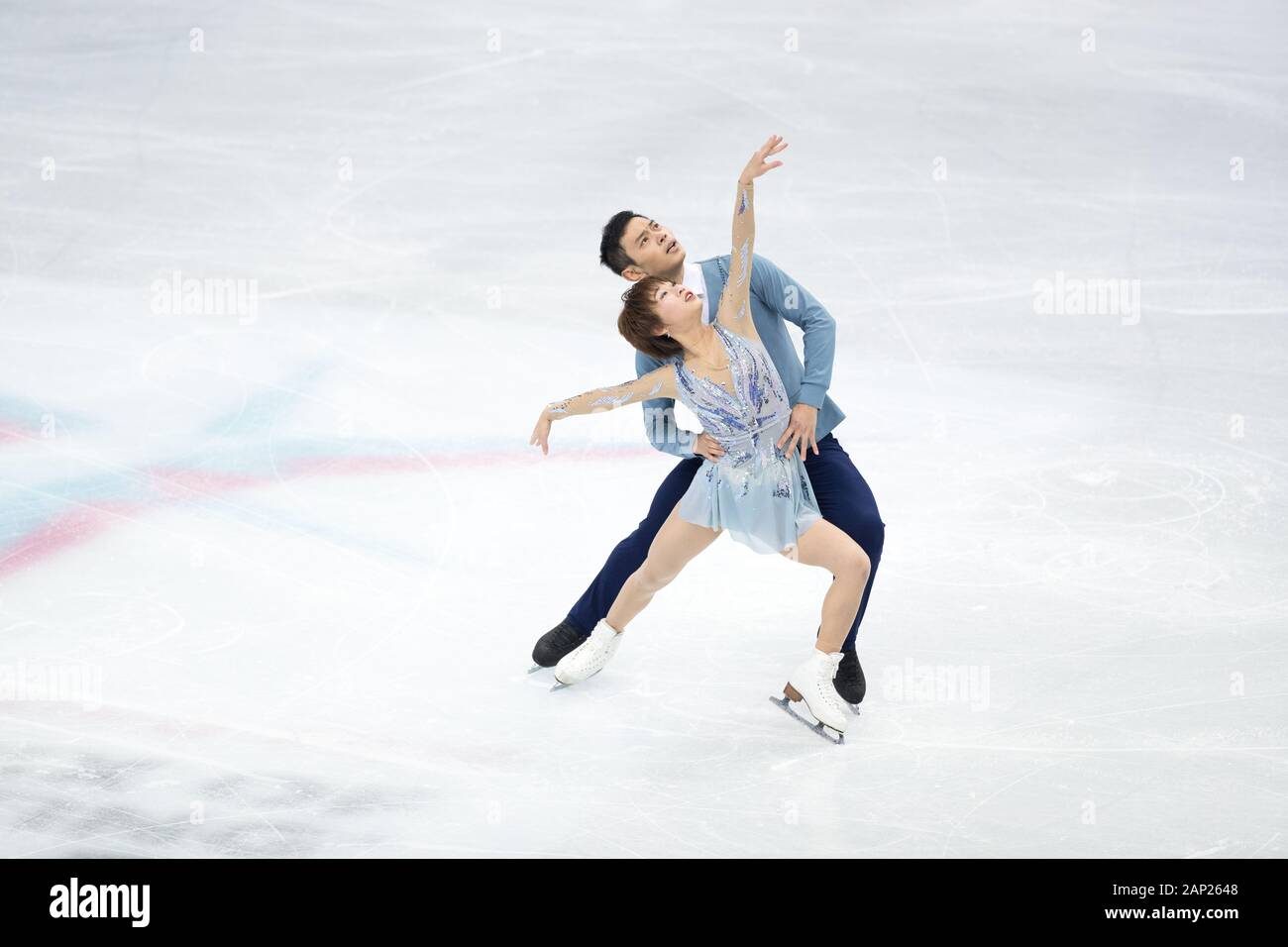 Cheng Peng and Yang Jin of China compete during senior pairs free ...
