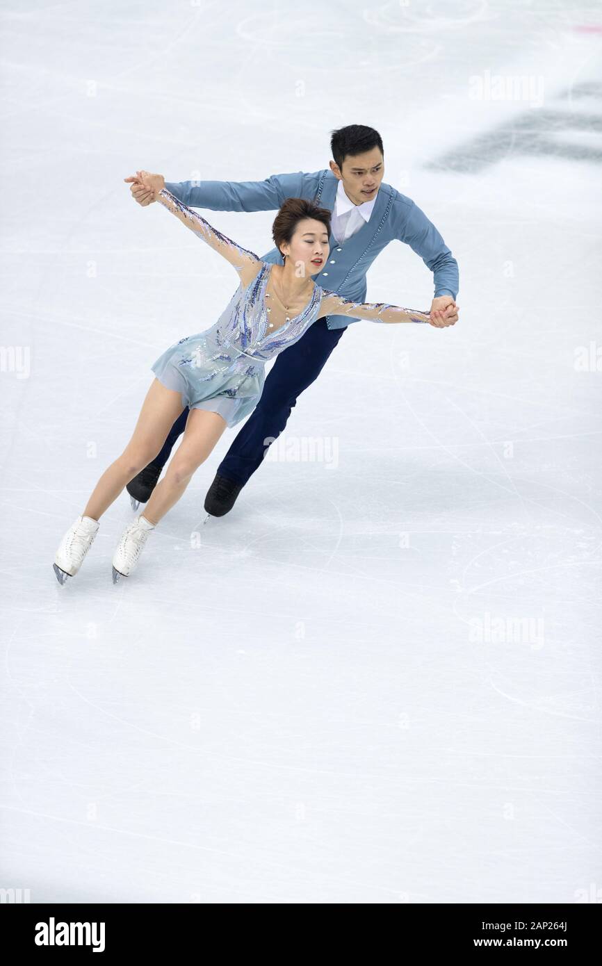 Cheng Peng and Yang Jin of China compete during senior pairs free ...