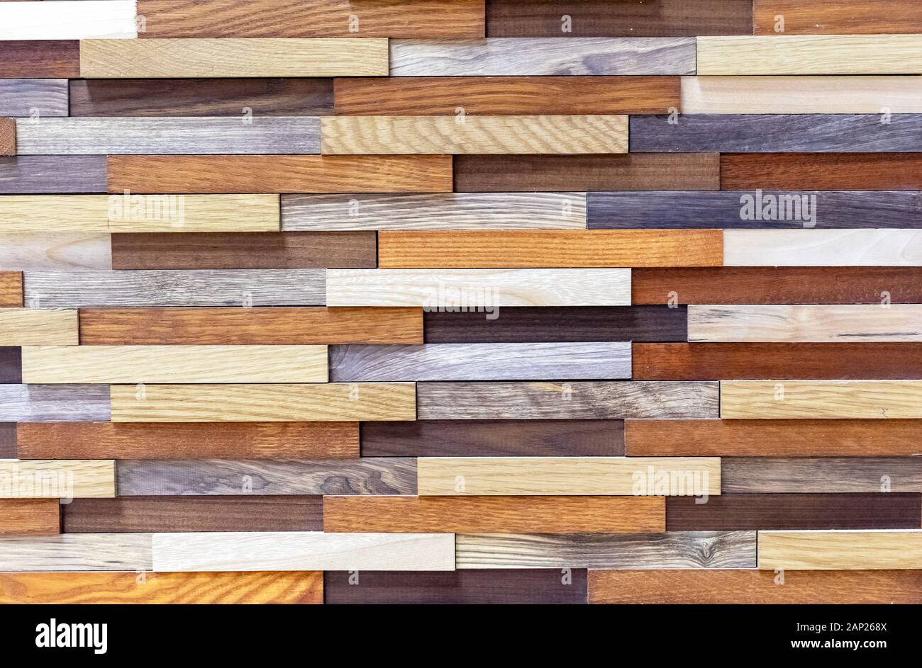 Wooden blocks of different colors. Rectangles from different species of ...