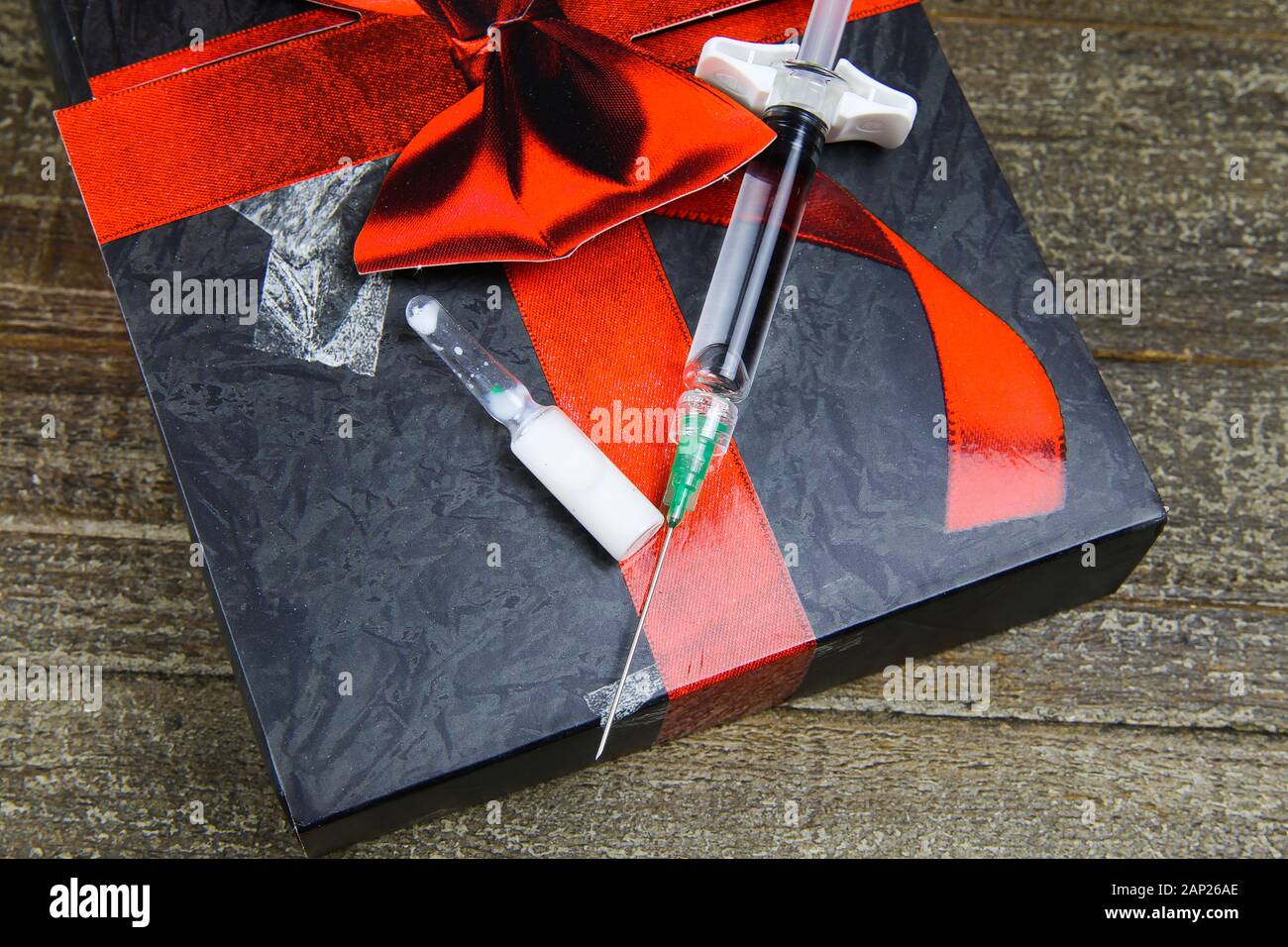 Poisoned chalice gift symbol concept: isolated syringe with injection ...