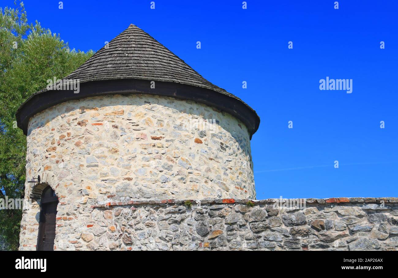 Tower with wooden roof as part of Red stone castle, Casta village ...