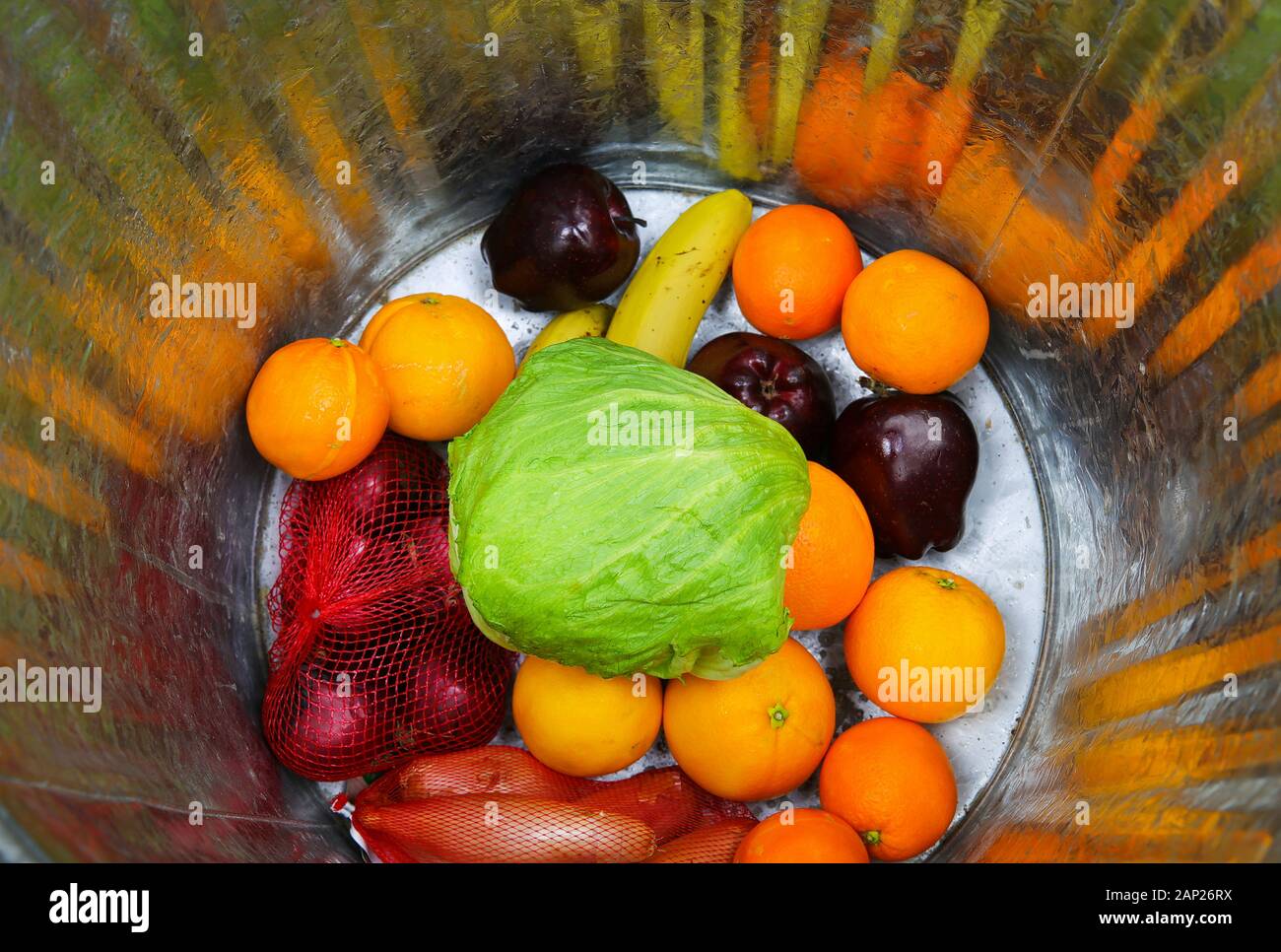 Food waste concept: View into silver metallic garbage bin on fresh ...