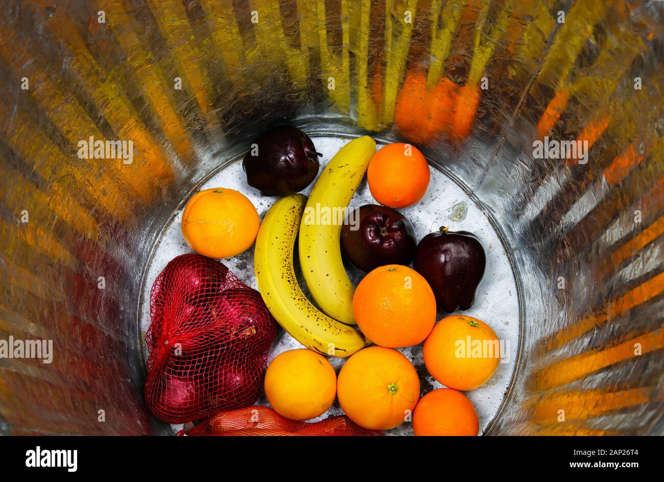 Food waste concept: View into silver metallic garbage bin on fresh ...