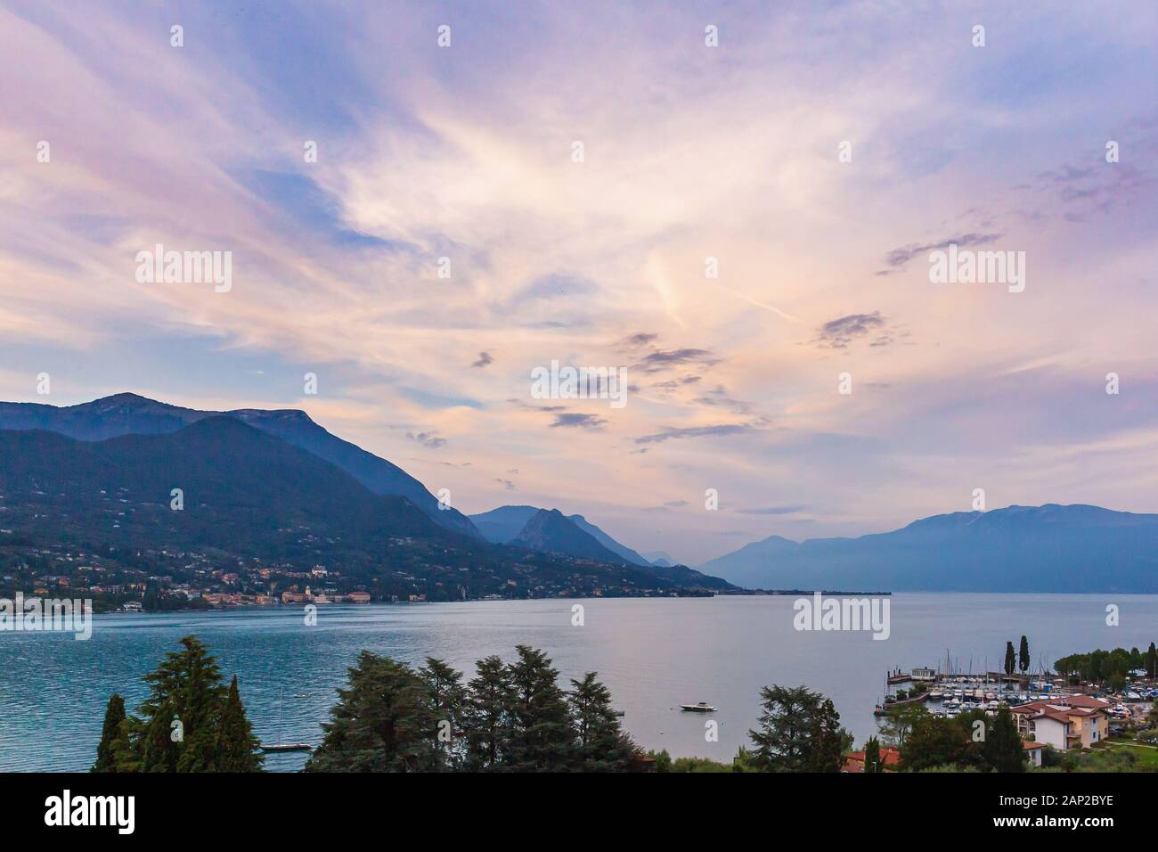 Portese, Italy, beautiful sunset above water at Lake Garda Stock Photo ...