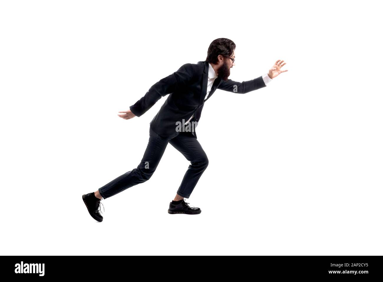 full length portrait of bearded, trendy businessman running isolated on ...
