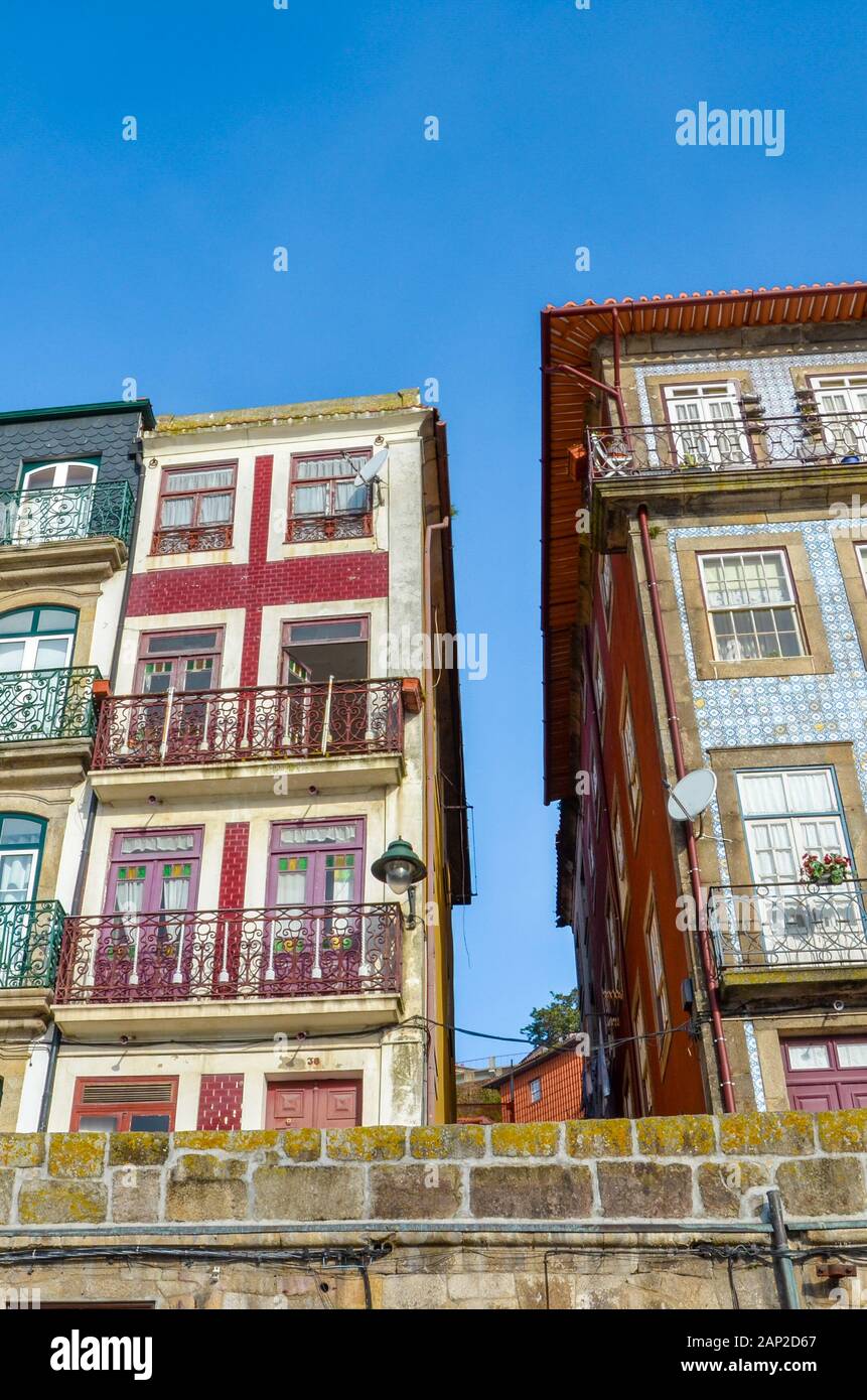 Traditional Portuguese houses with colorful facades by the Douro river ...