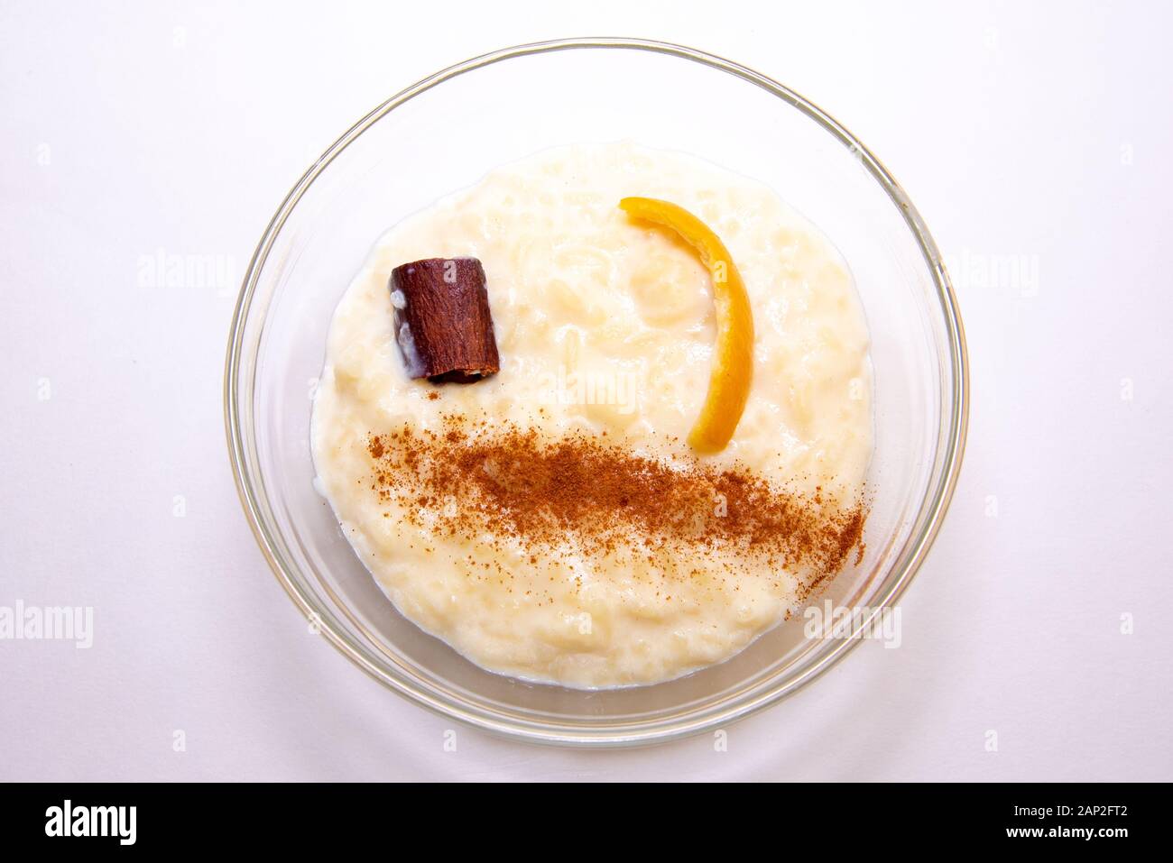 Rice pudding, typical dessert in Spain over a white background Stock ...