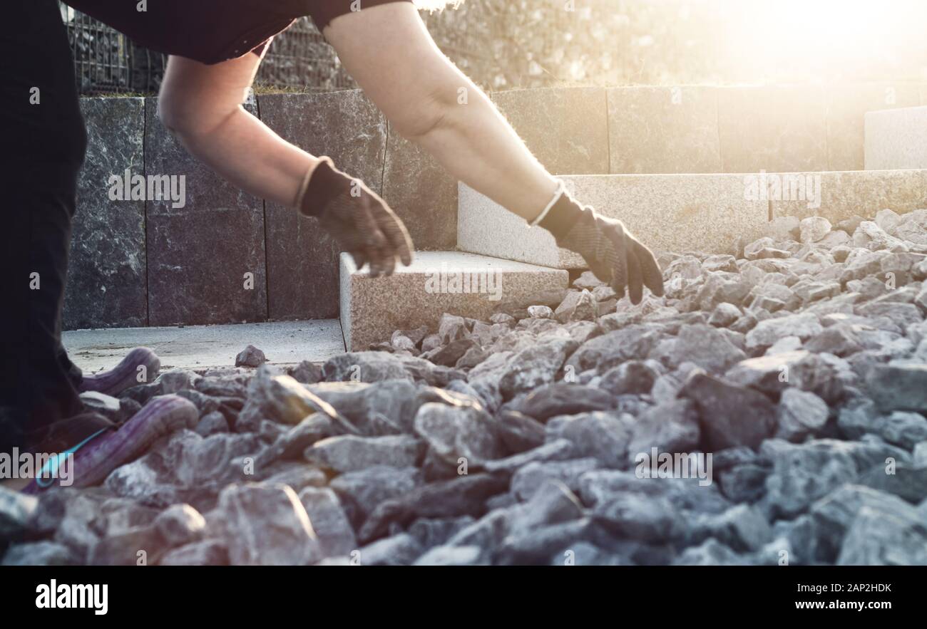 Lifting stones hi-res stock photography and images - Alamy