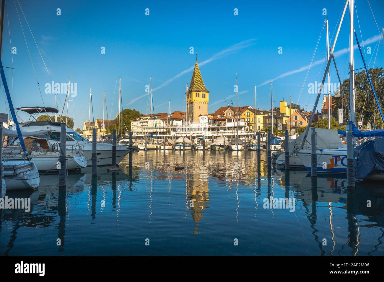Lindau, Germany, July 2019 - View of marina and the Mangturm tower ...