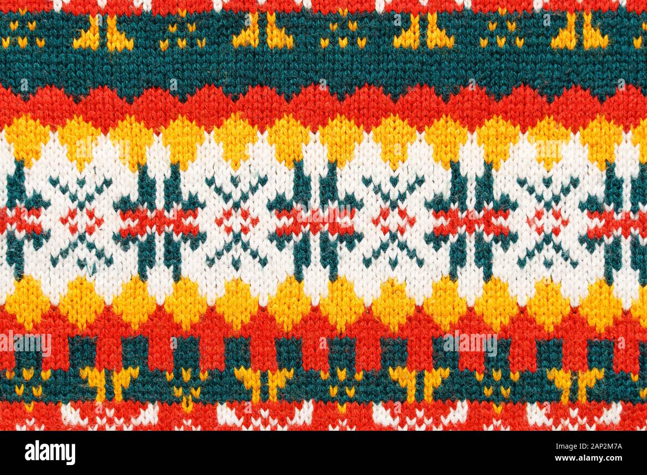 Motley christmas sweater texture with patterns. Colorful knit texture ...