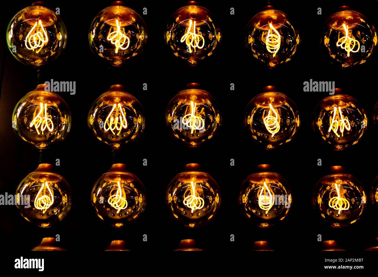 Isolated group of yellow gold shining retro classical light bulbs in ...