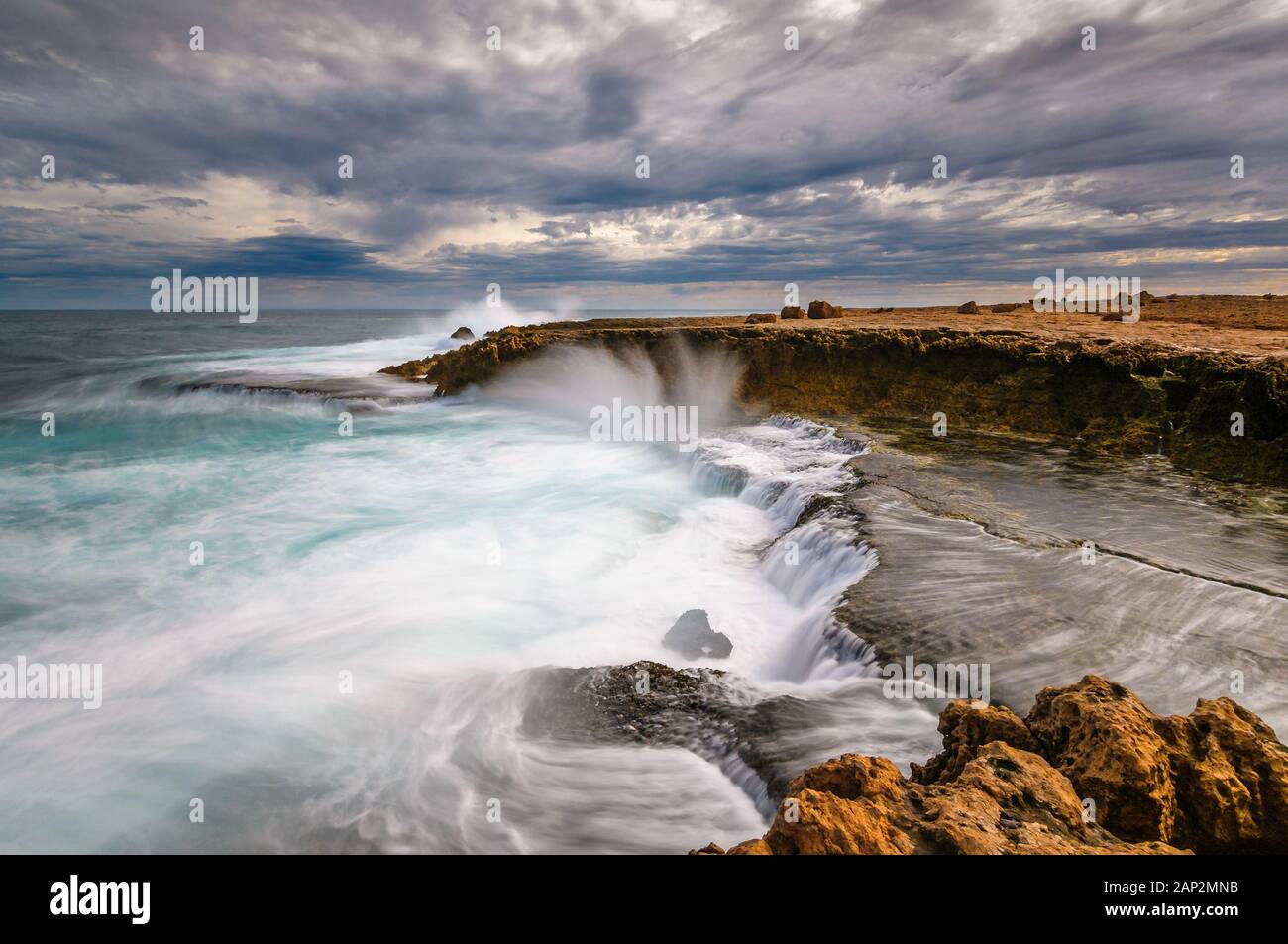 Long exposure capture of the rough waters on the rugged Indian Ocean ...
