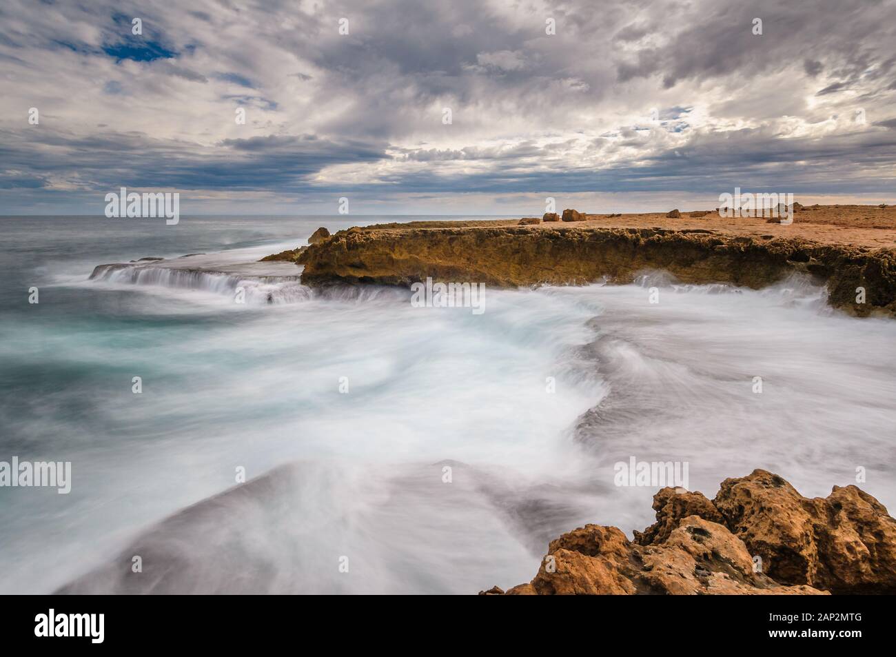 Long exposure capture of the rough waters on the rugged Indian Ocean ...