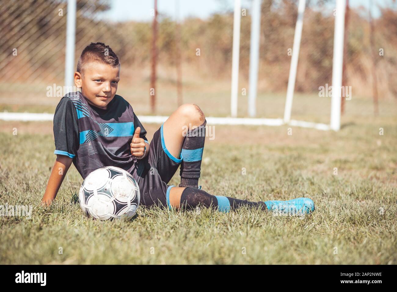 Joyful boy soccer player after victory. Boy Celebrating Soccer Football ...