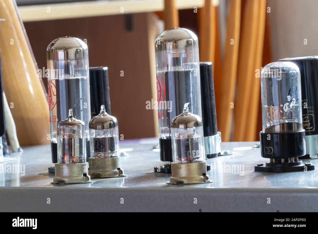 Audio tubes on a hand made guitar AMP Stock Photo - Alamy