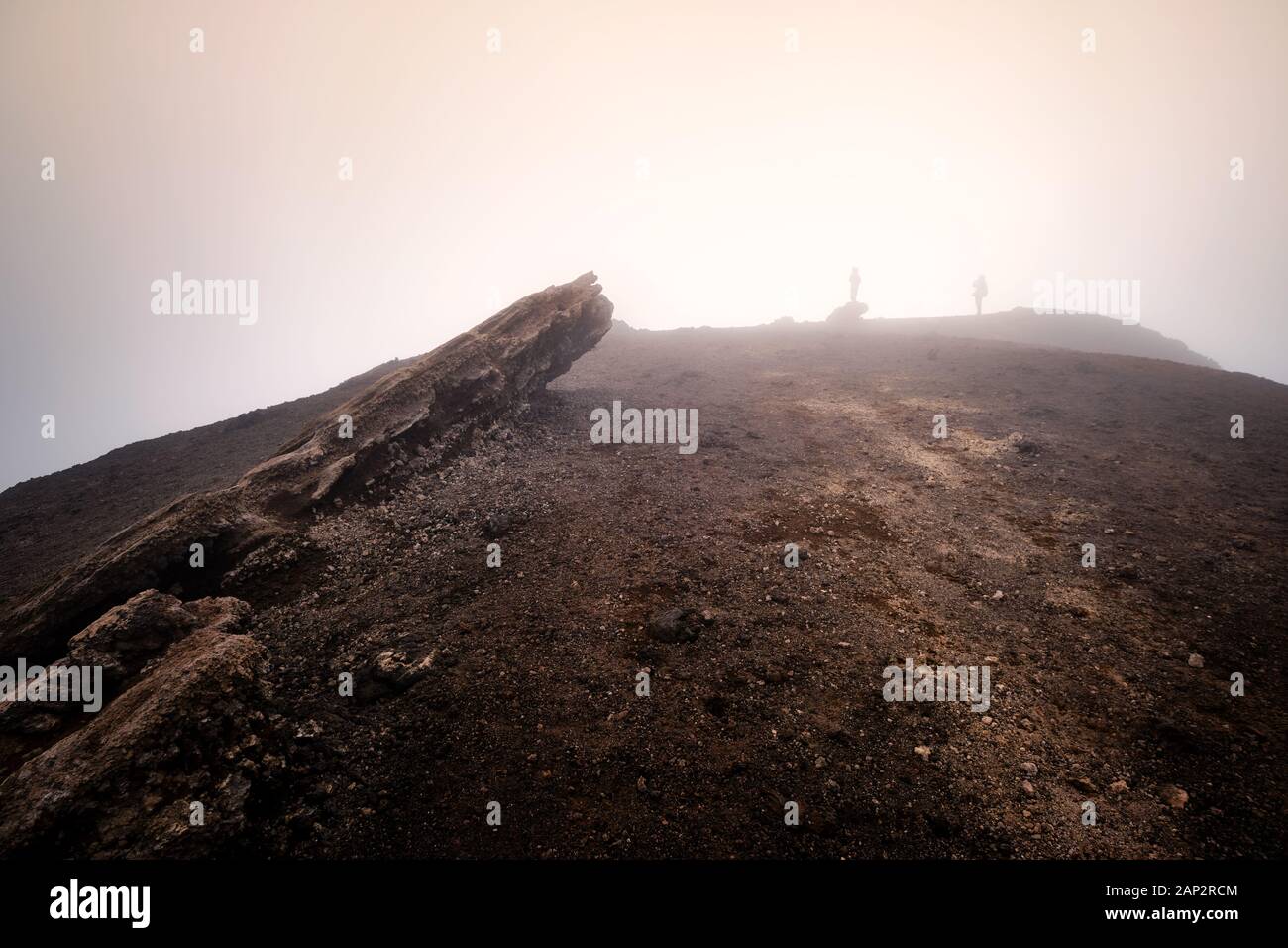 People climbing, hikers in trekking activity on Mount Etna, active ...