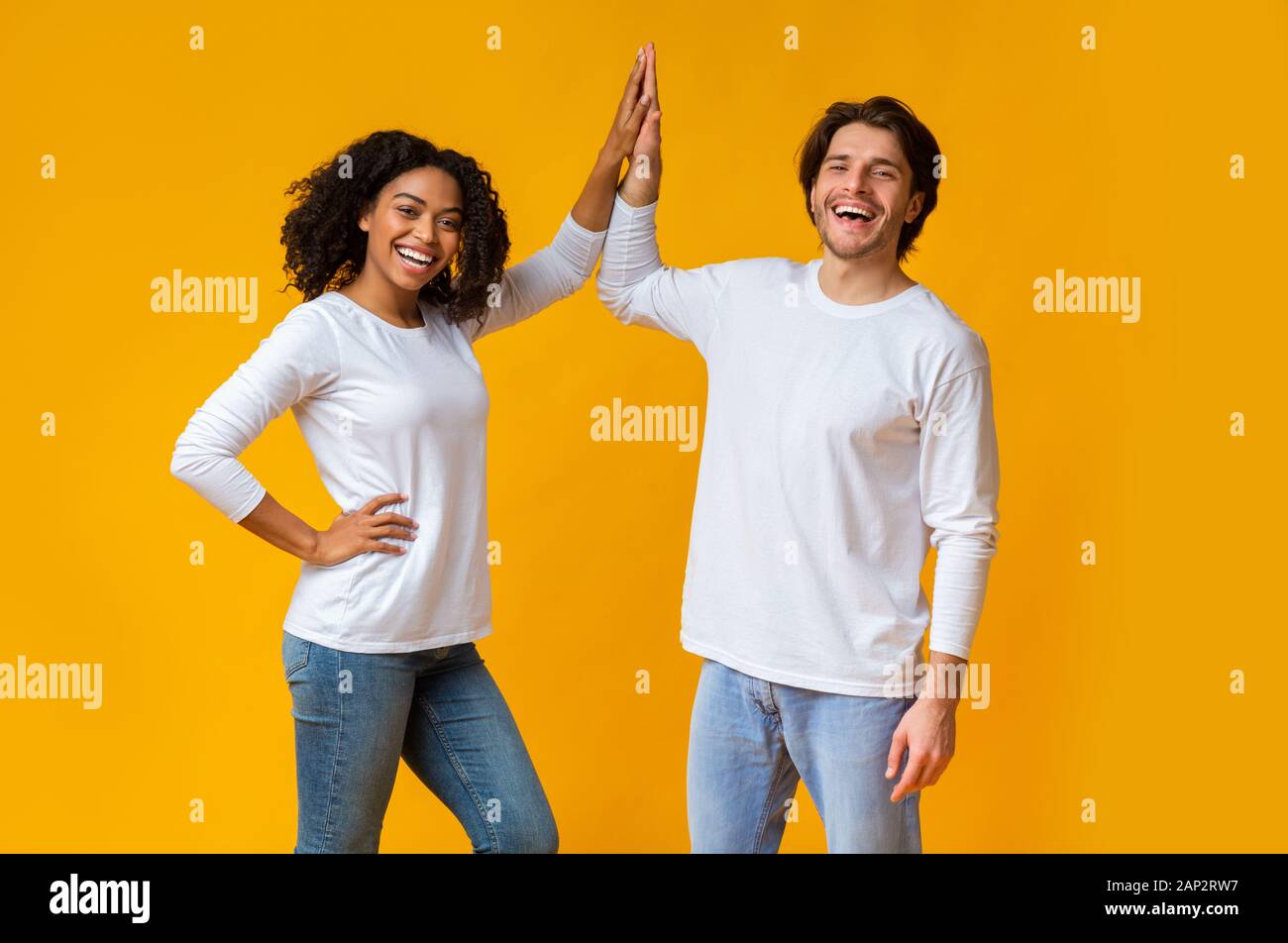 High five greeting white black hi-res stock photography and images - Alamy