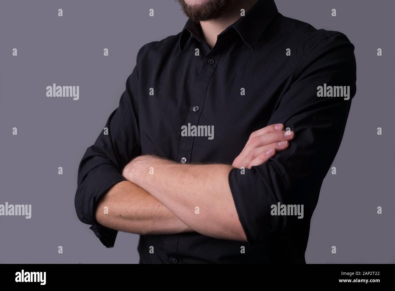 A man in a black jacket, on a dark gray background. minimalistic ...