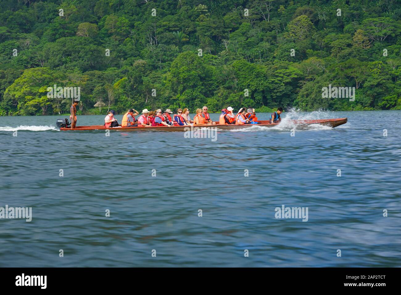 Tourist in dugout canoe toward the Embera Indigenous Village in the ...