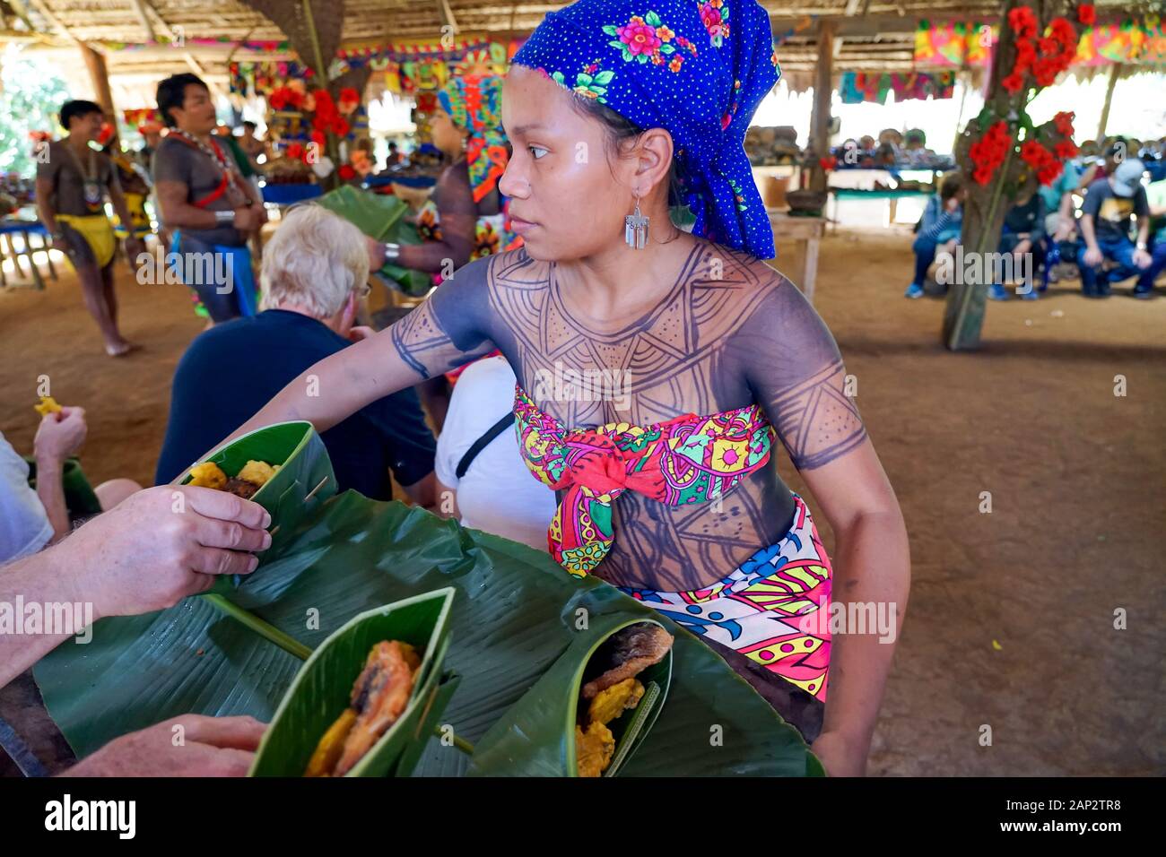 Serving food of fish and vegetables to the tourists, Embera Indigenous ...